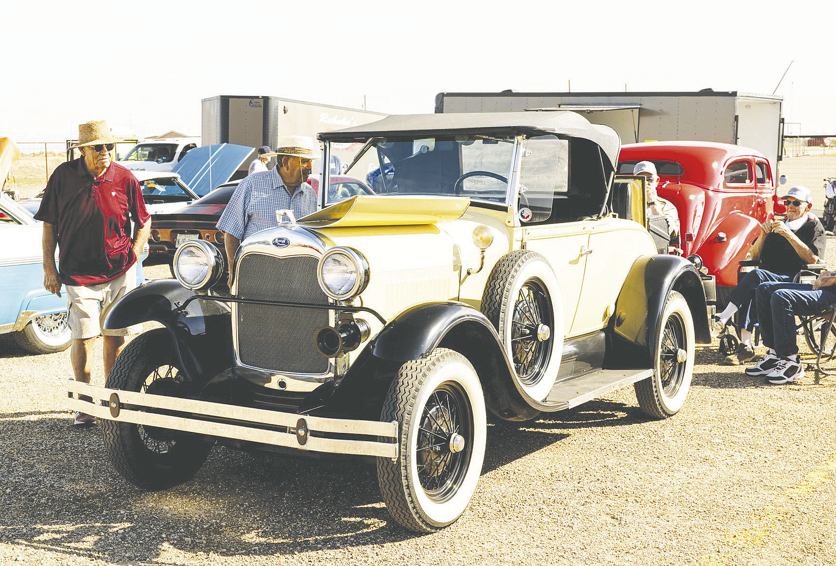 Folks admiring classic cars at a past Redneck Roundup Car & Truck Show ...